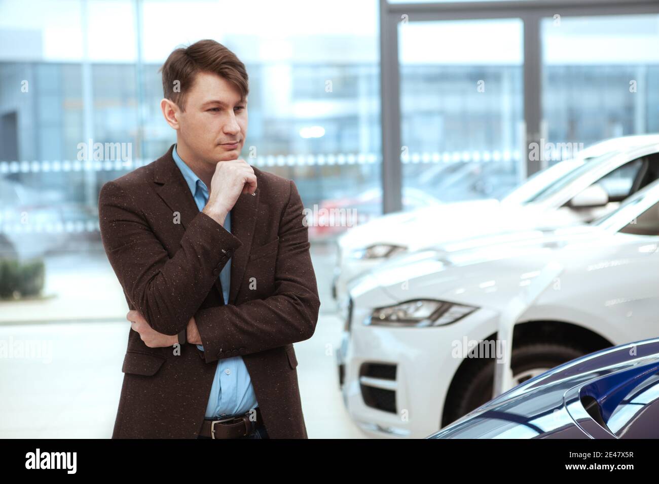 Mature man examining cars hi-res stock photography and images - Alamy