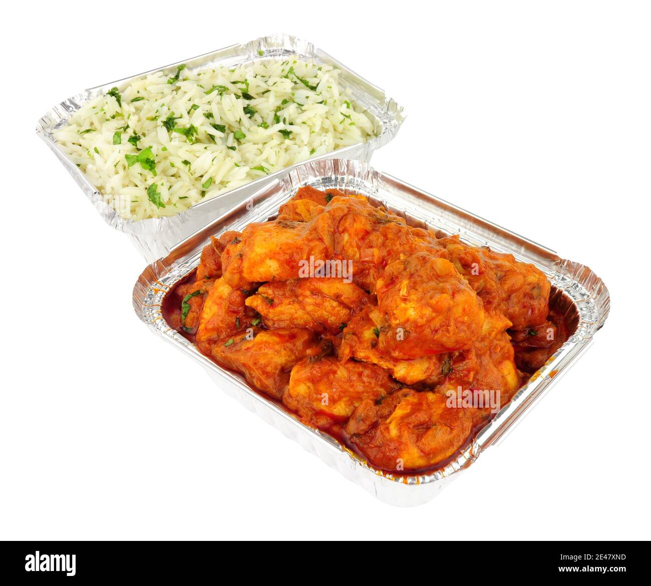 Chicken curry take away meal with rice in foil containers isolated on a ...