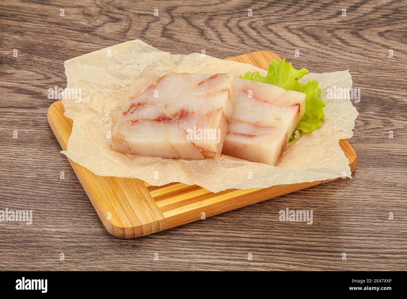 Raw dietary pollock fish fillet for cooking Stock Photo - Alamy