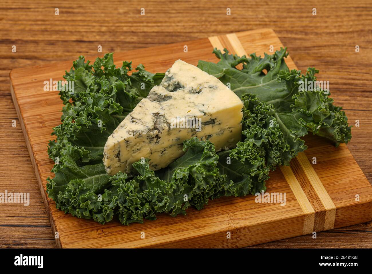 Dairy Blue cheese triangle with mold Stock Photo - Alamy