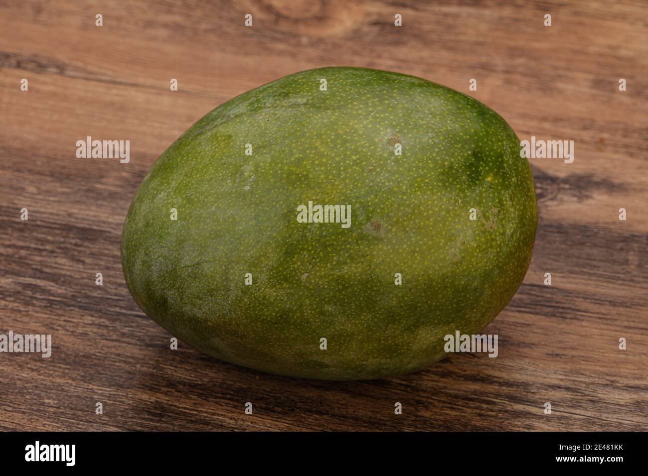 Tropical fruit - Green sweet tasty mango Stock Photo - Alamy