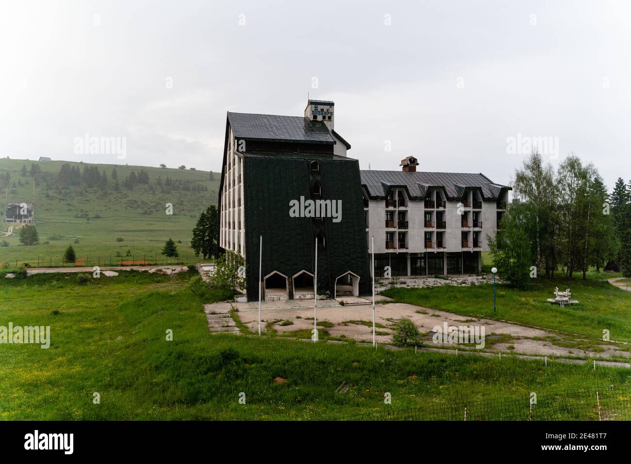 Hotel in a green field Stock Photo - Alamy