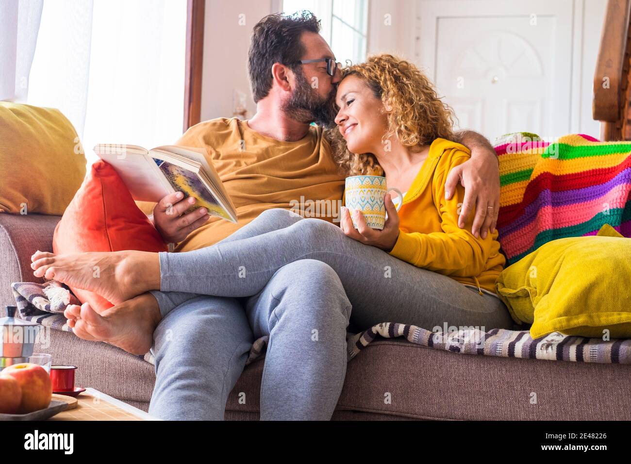 Happy Beautiful Caucasian Couple At Home Enjoy Morning Leisure Activity