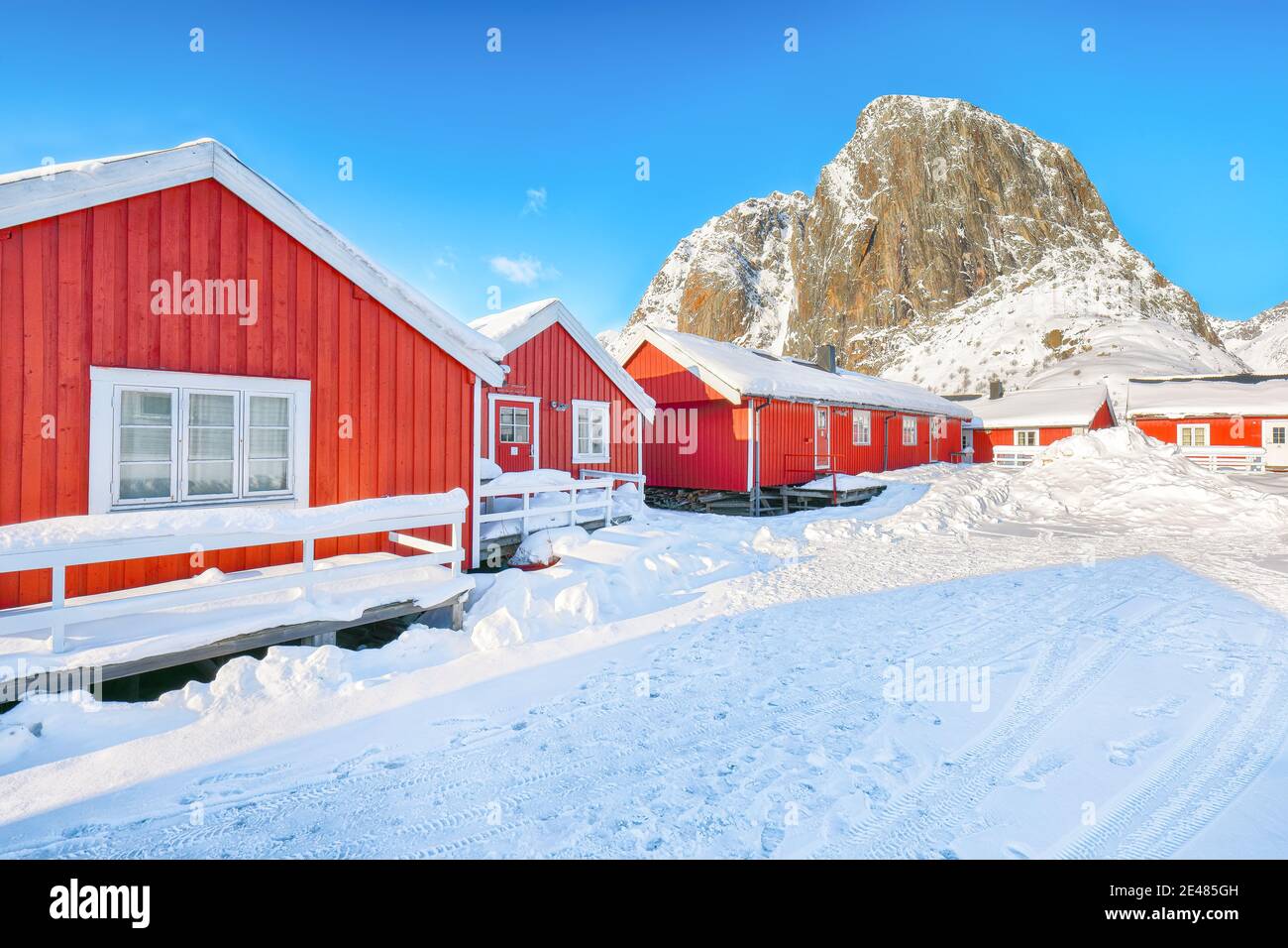 Winter view on Hamnoy village and Festhaeltinden mountain on background ...
