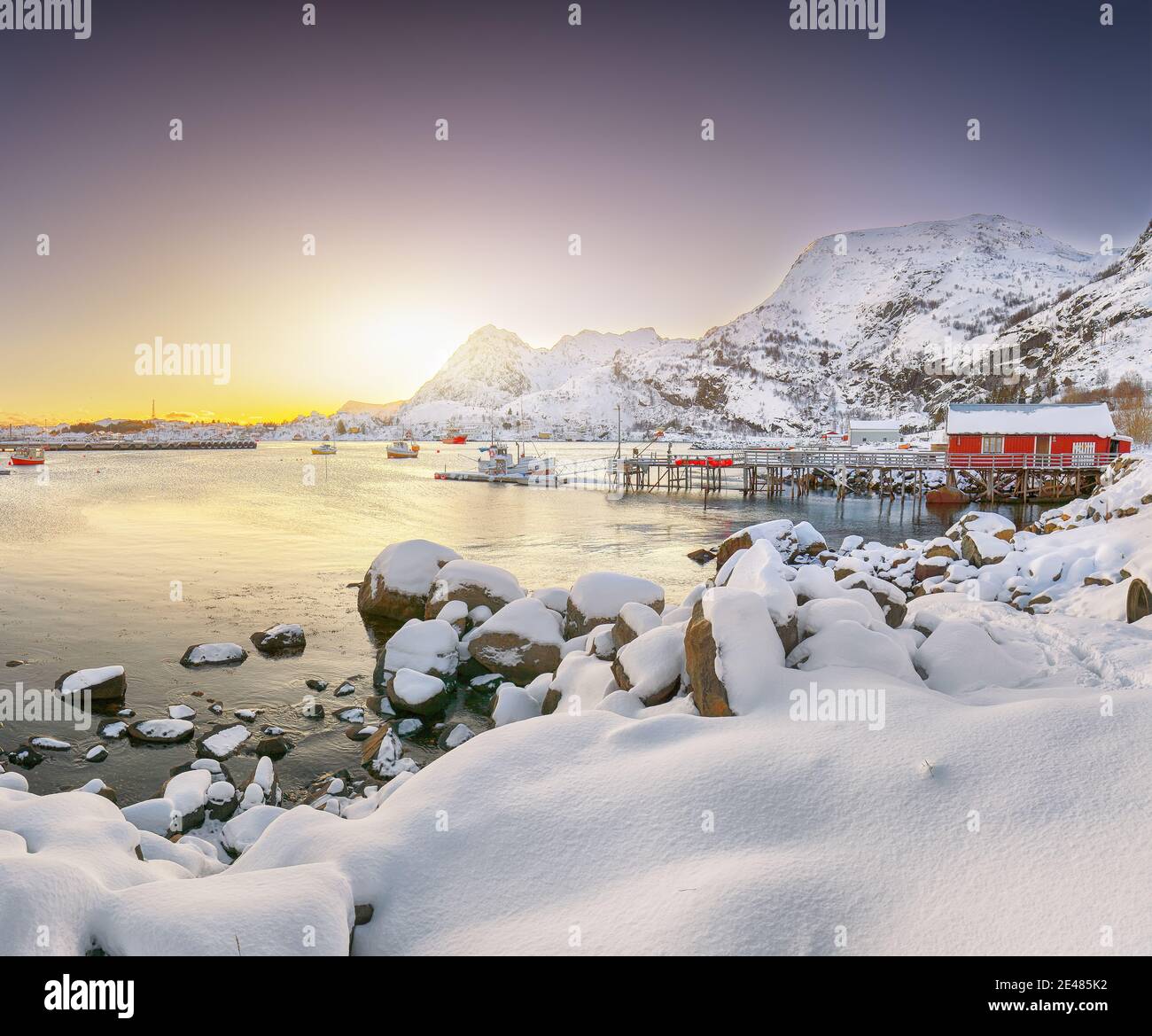 Stunning winter scenery of Moskenes village with ferryport . Popular ...