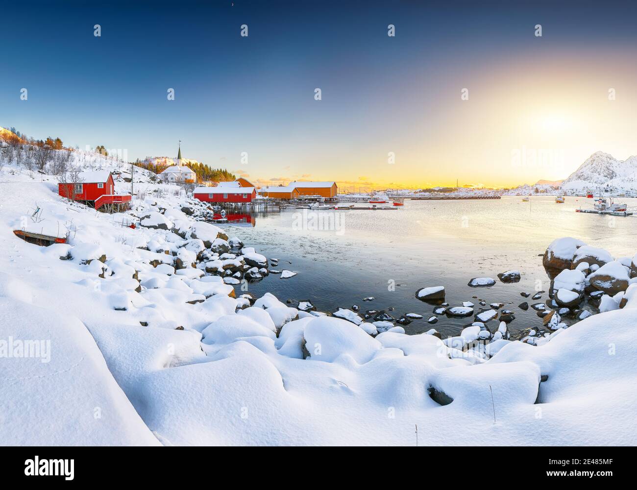 Amazing winter scenery of Moskenes village with ferryport and famous ...