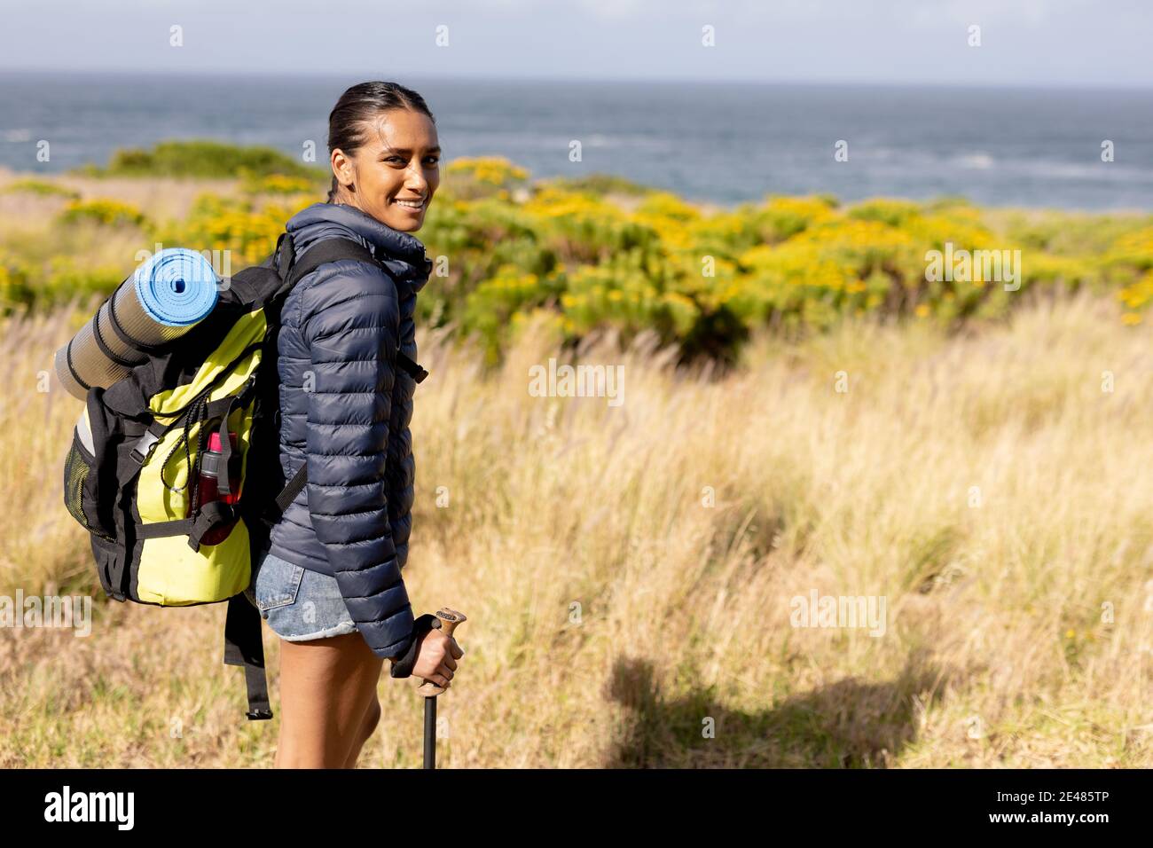 Woman wearing backpack hi-res stock photography and images - Alamy