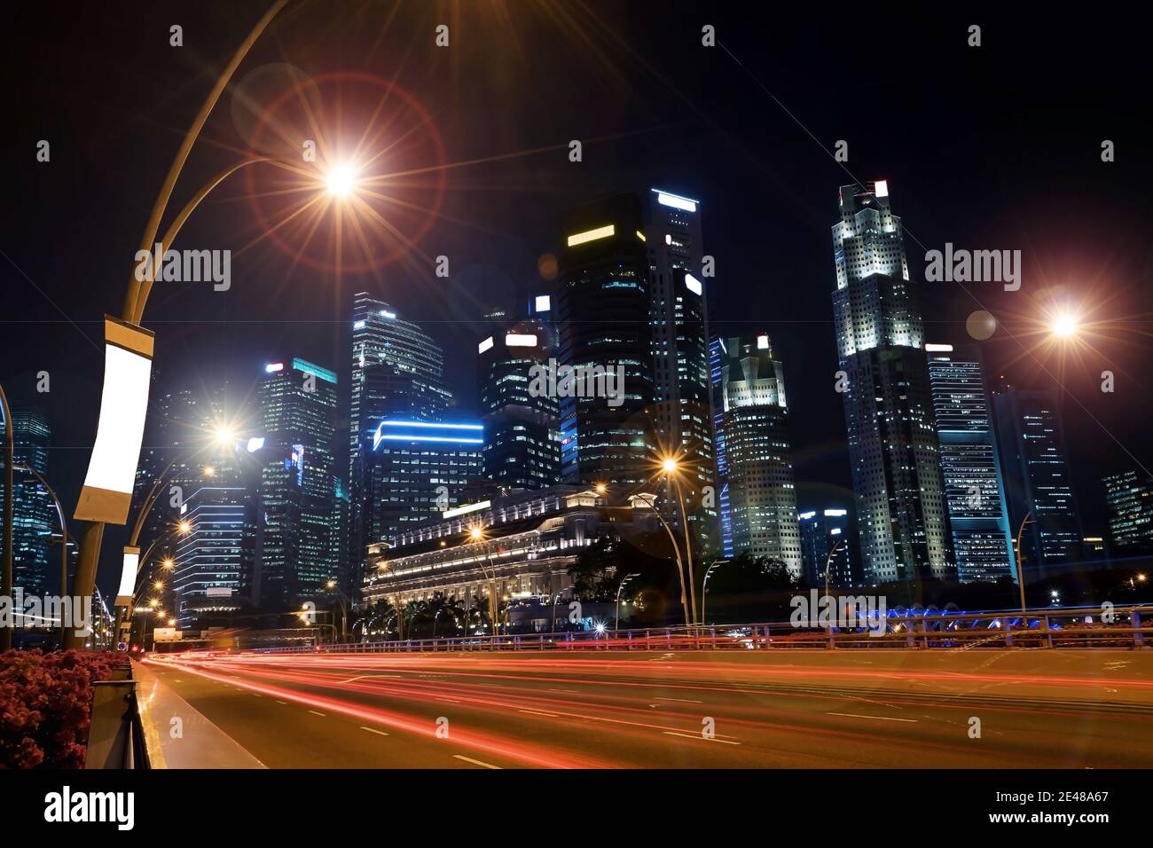 The beauty of car lights and street lighting with lens flare effect at ...