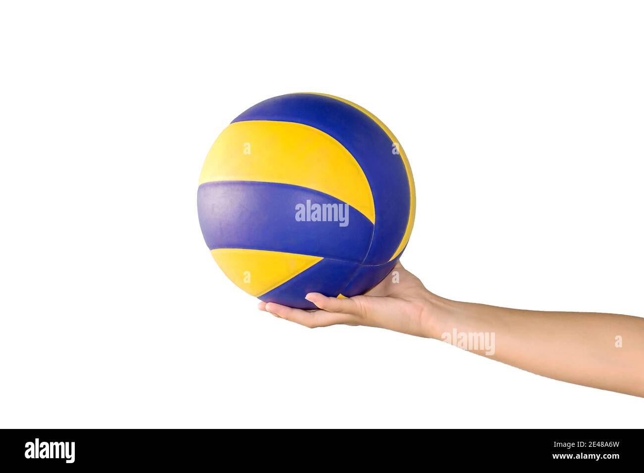 Hand of young woman holding the volleyball isolated on white background ...