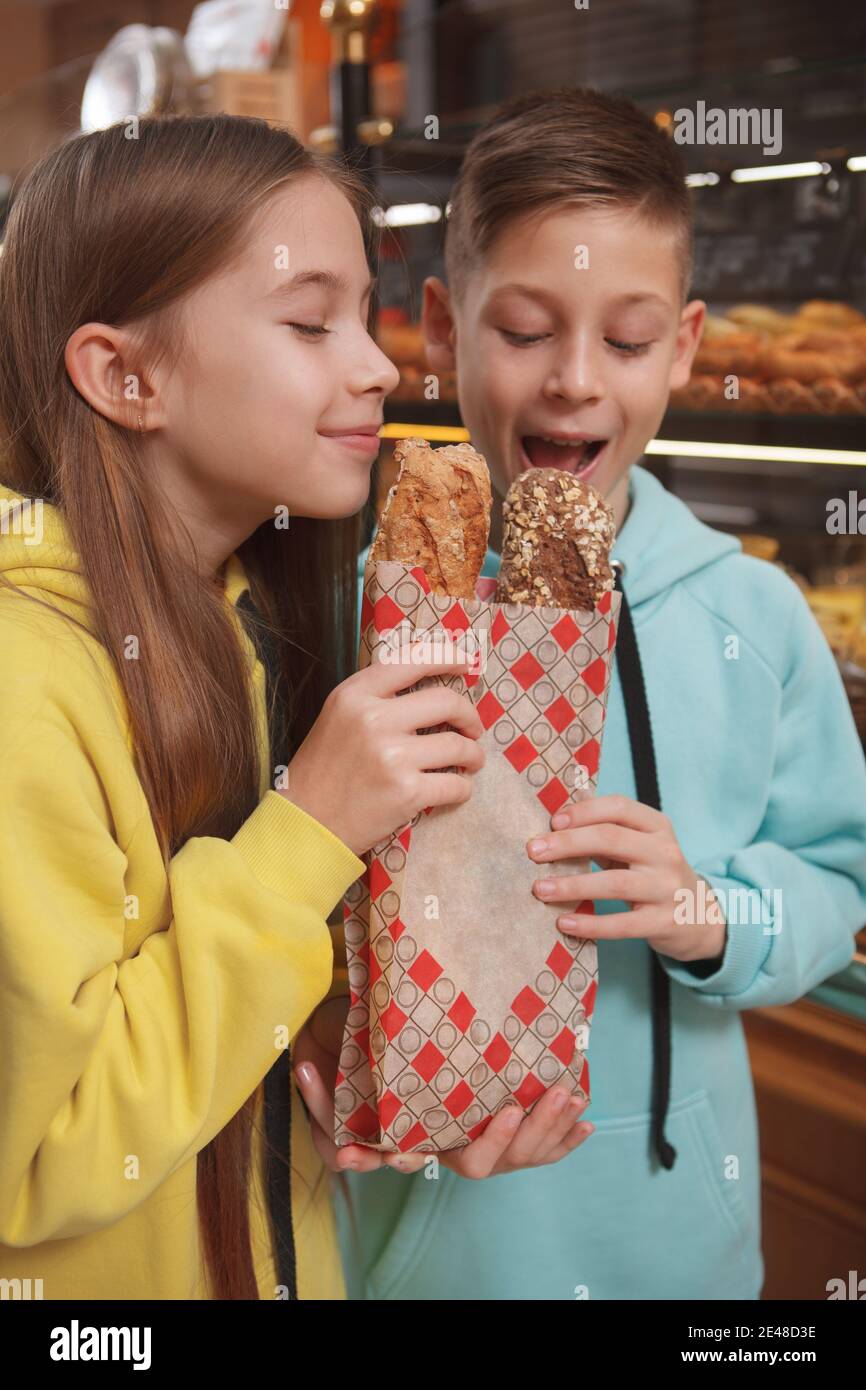 Smelling bread children hi-res stock photography and images - Alamy