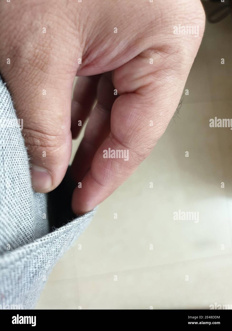 Fingers in pocket hi-res stock photography and images - Alamy