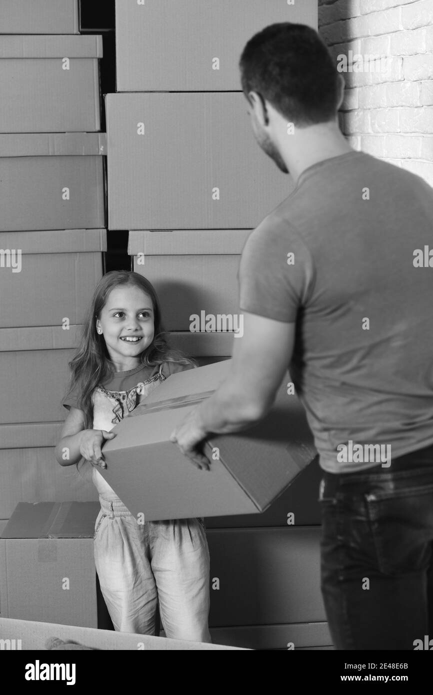Happy man packing boxes Black and White Stock Photos & Images - Alamy