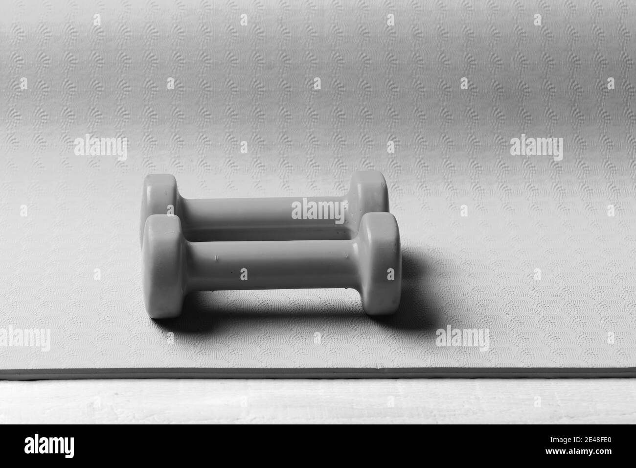 Barbells in small size, close up and copy space. Shaping and fitness ...