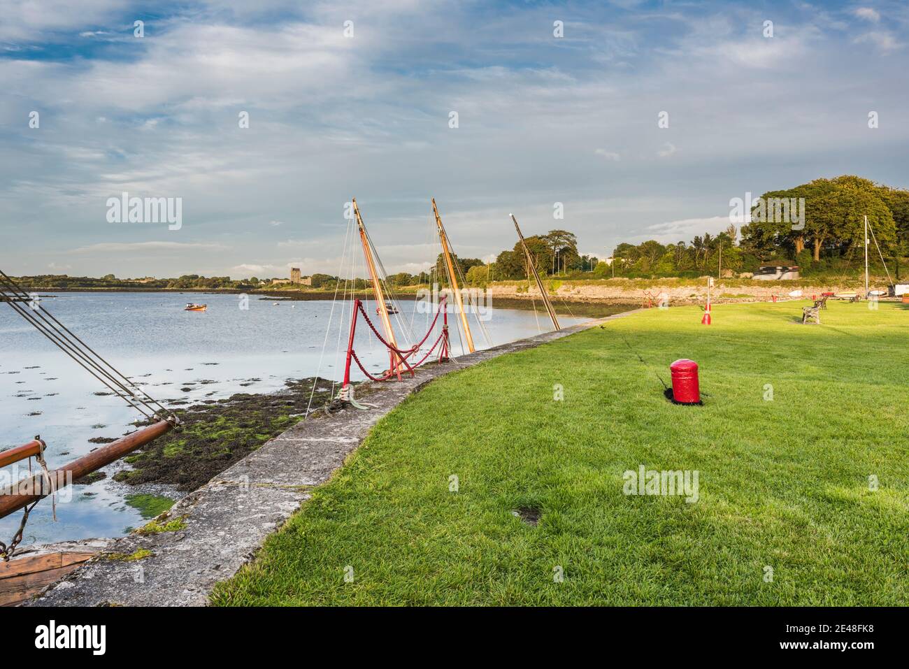 A peaceful evening on the quayside at Kinvara Bay, with Dunguaire ...