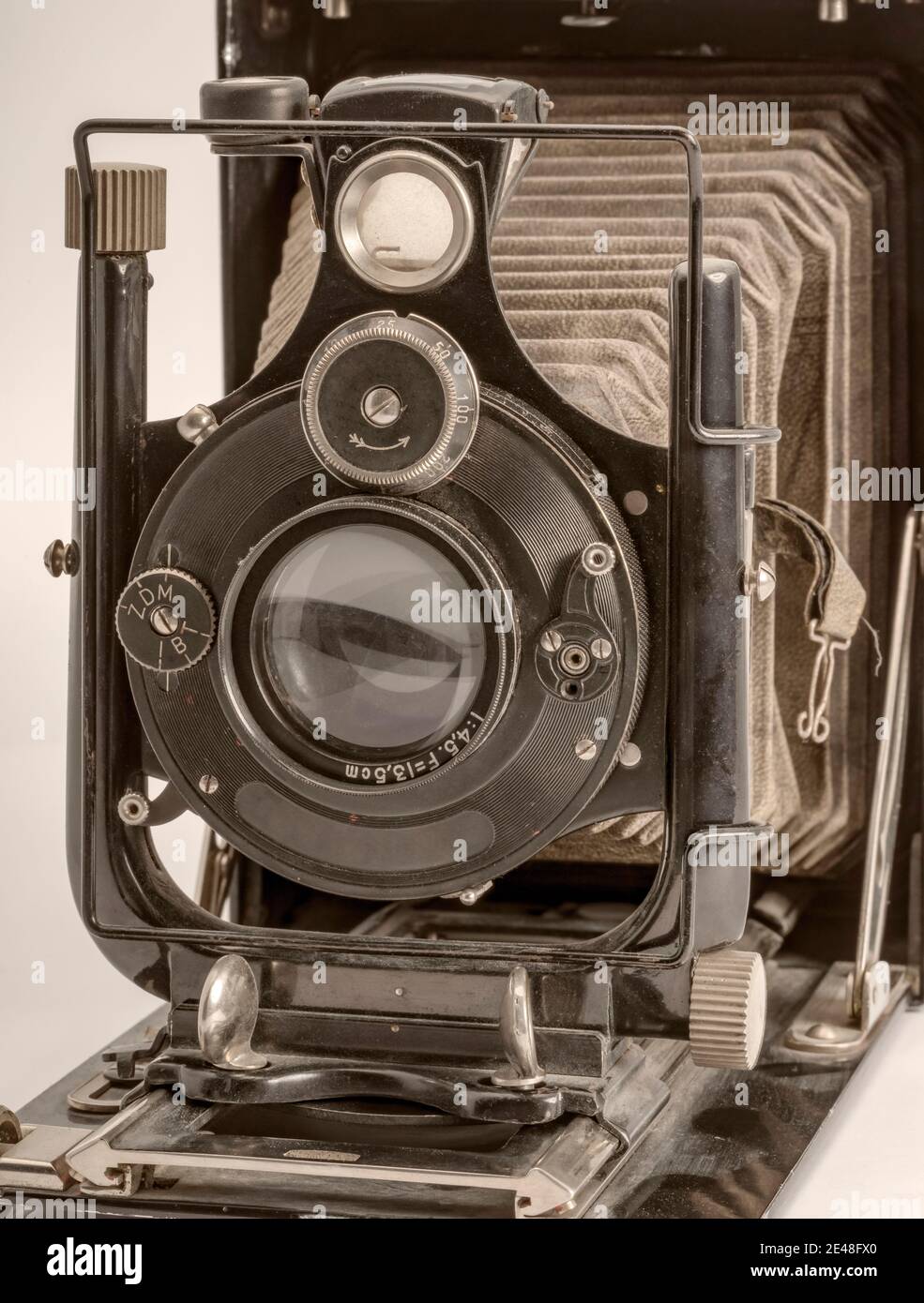 historic folding camera isolated in white back Stock Photo - Alamy