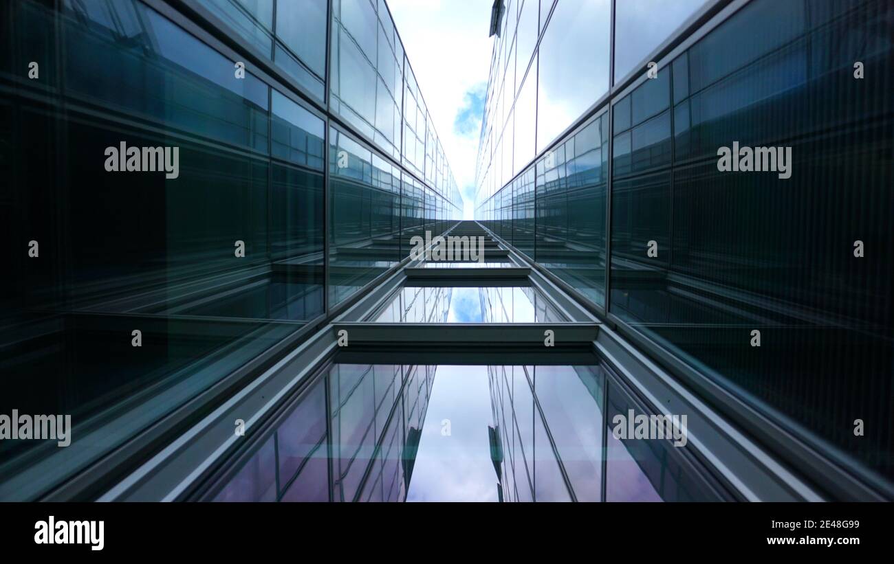 View from the ground to the sky, surrounded by high rise skyscraper ...