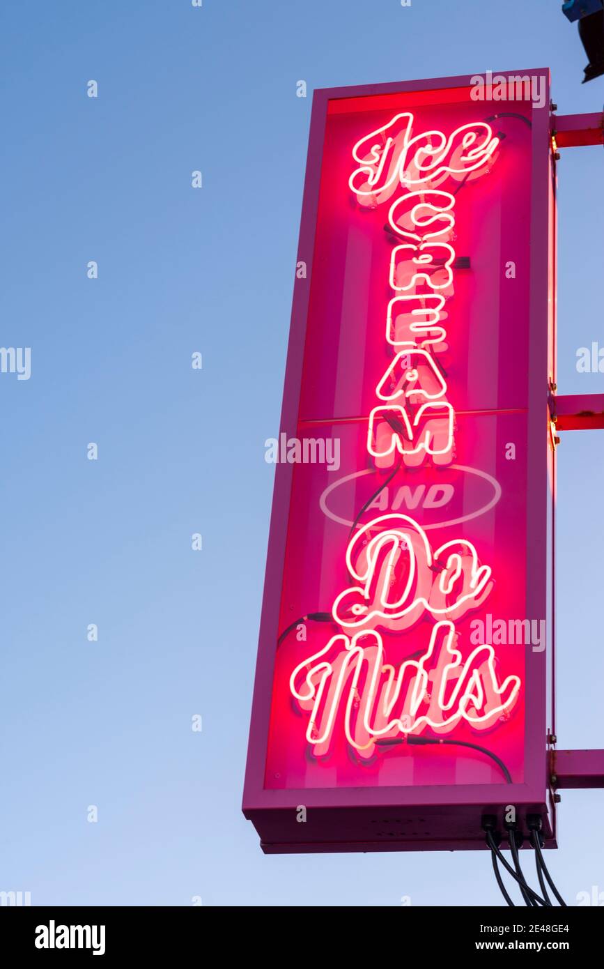 Neon sign advertising for the Three Shells seafront take away ...