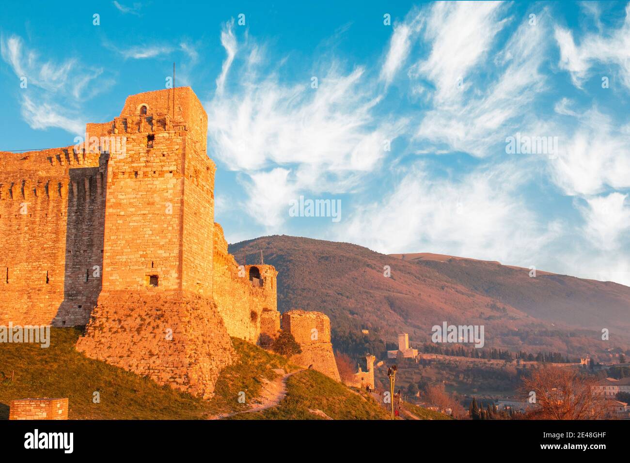Close up view of medieval castle up the hill of Assisi, province in ...
