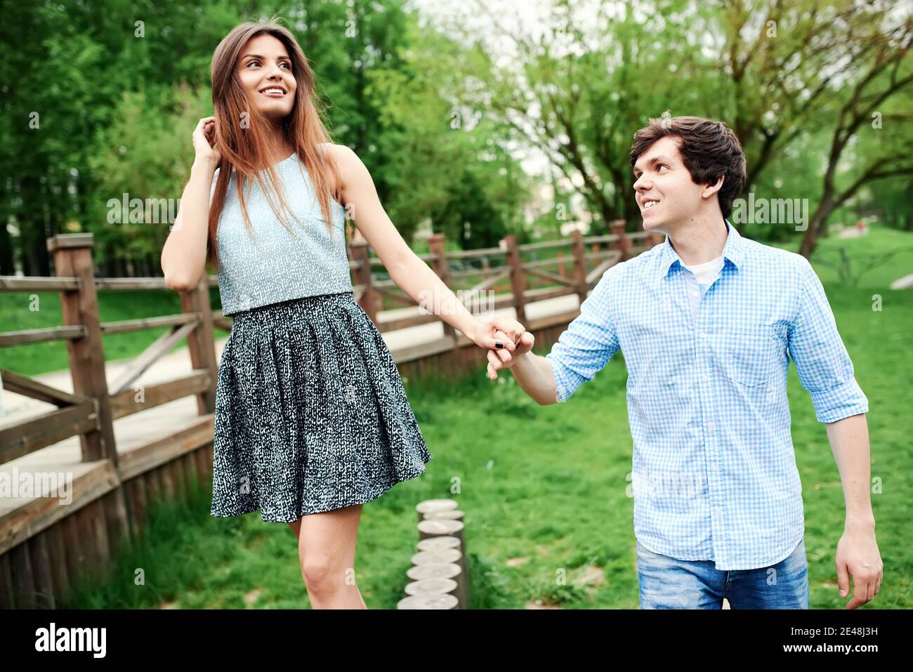 Girl guy holding hands walking hi-res stock photography and images - Alamy