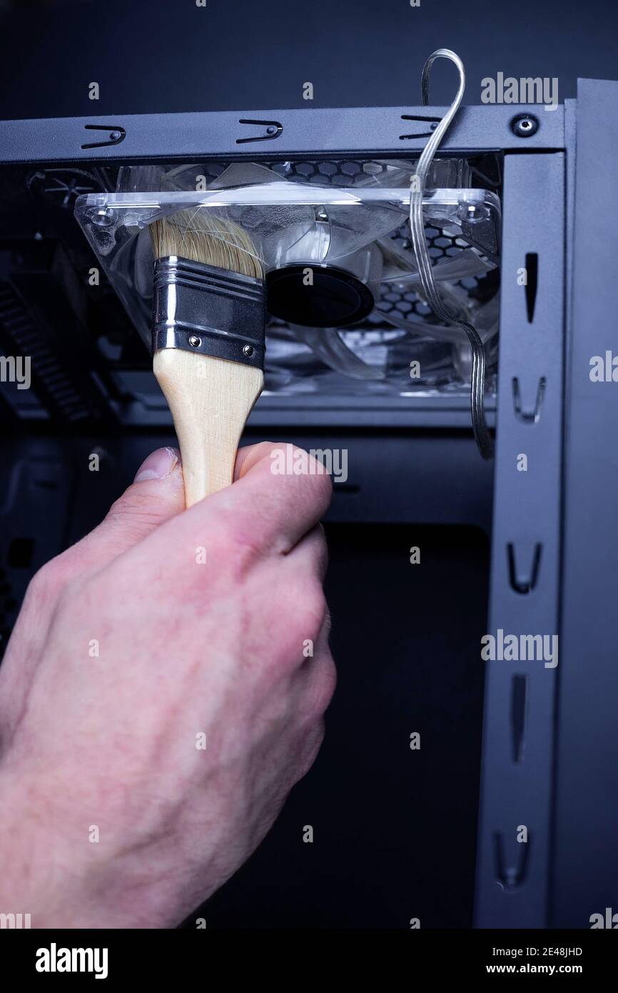 Hand clean inside computer special hi-res stock photography and images ...