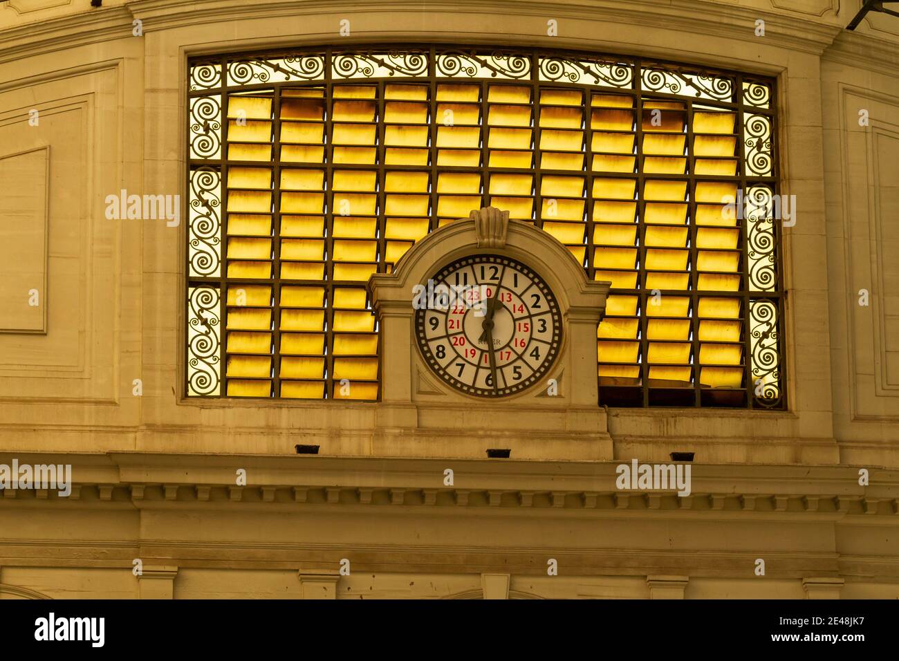 Train station clock yellow hi-res stock photography and images - Alamy