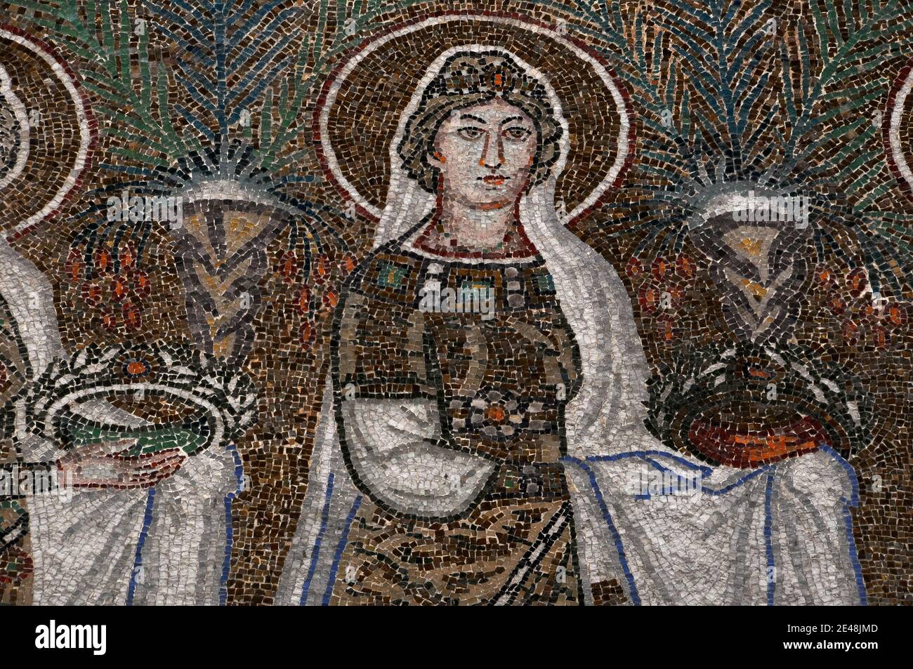 One of 22 sumptuously dressed female Christian Saints walks in ...