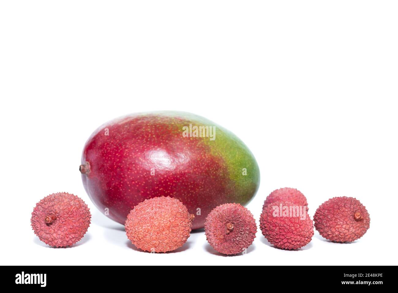 Mango and lychee on isolated white background Stock Photo - Alamy
