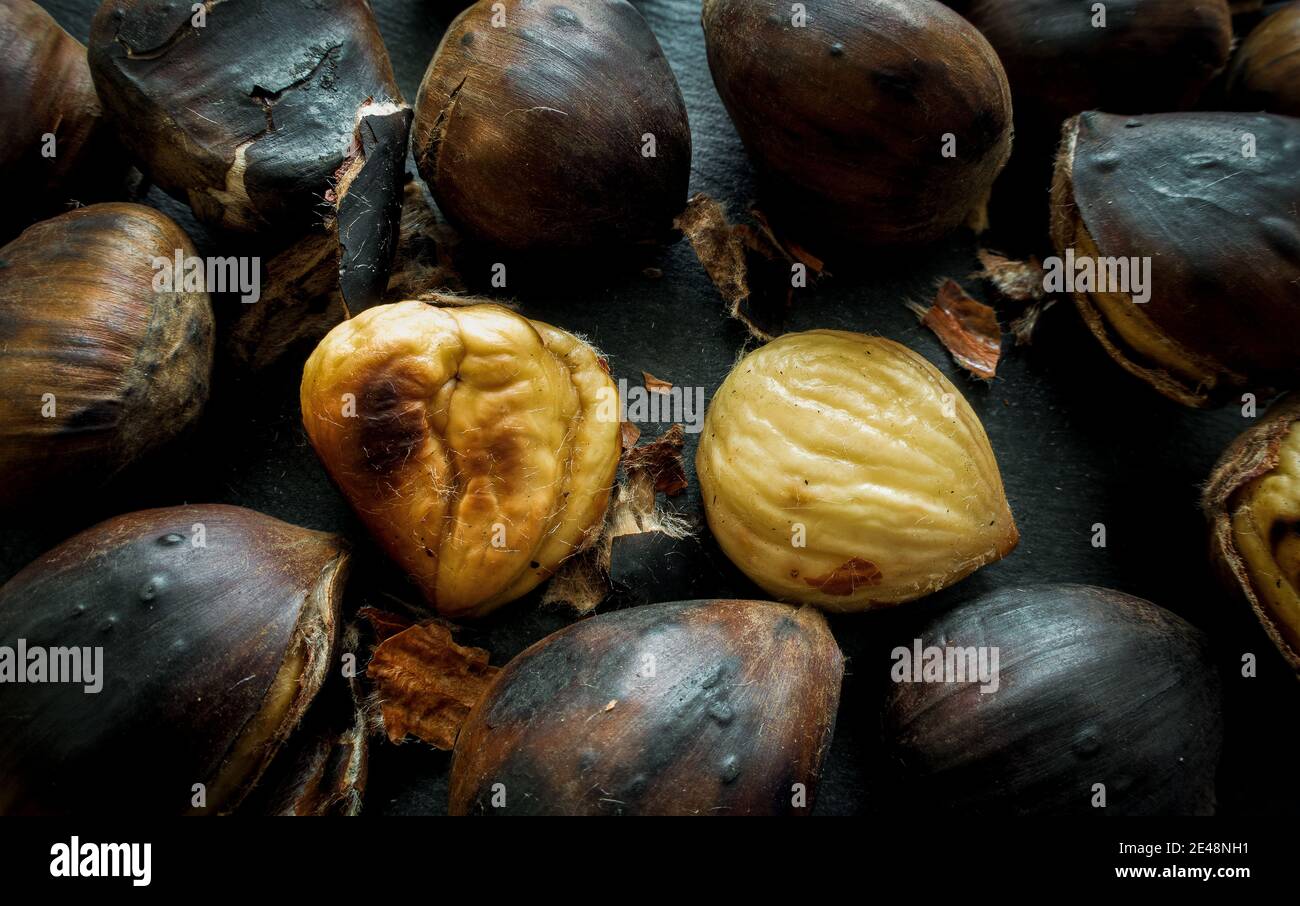 Delicious grilled chestnuts roasted chestnuts hi-res stock photography ...