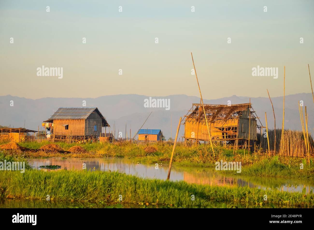 Old poor wooden houses near Inle Lake, Myanmar Stock Photo - Alamy