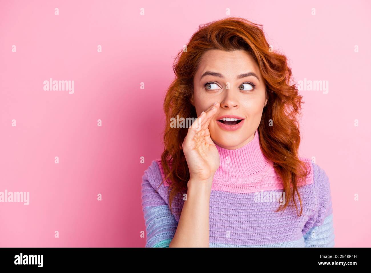 Photo portrait of woman telling secret looking at blank space isolated ...