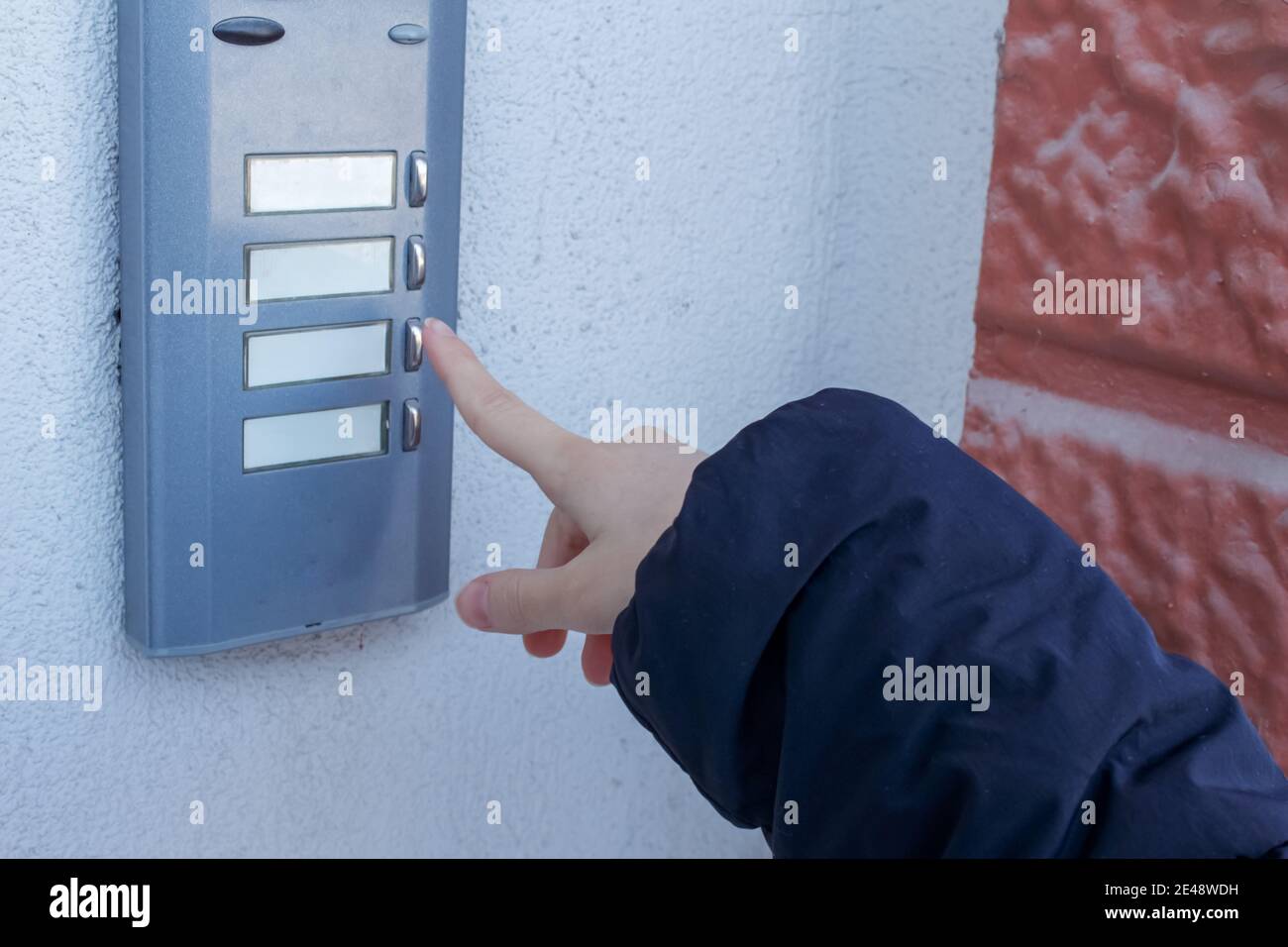 Woman Ringing Doorbell High Resolution Stock Photography and Images - Alamy