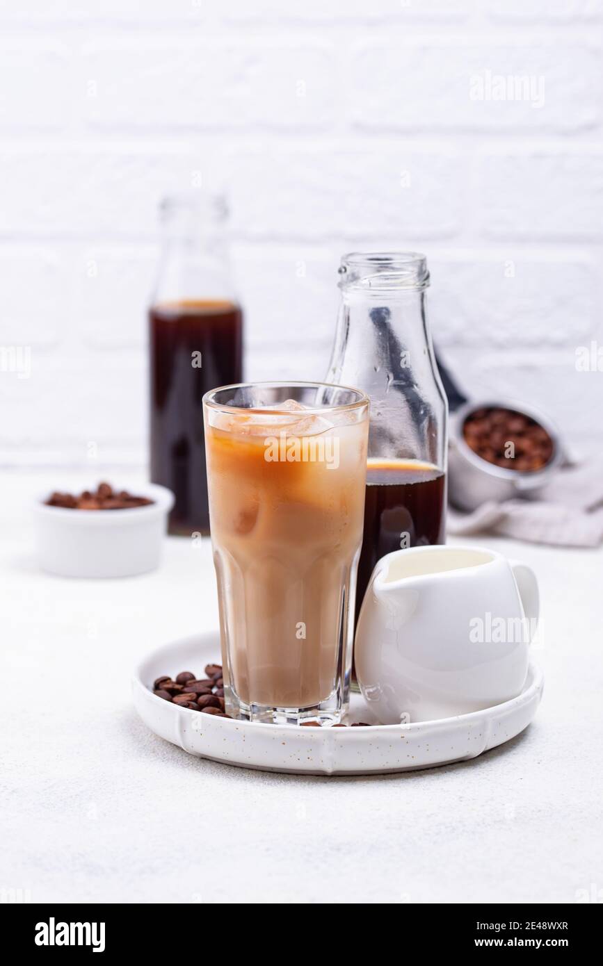 Cold brew coffee with ice and milk Stock Photo - Alamy