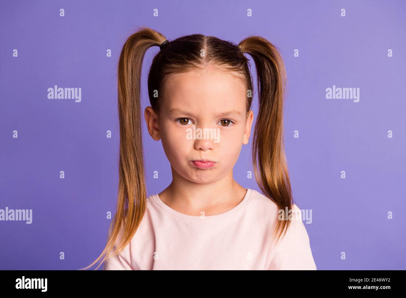 Photo of beautiful unhappy sad cute schoolgirl bad mood face isolated ...