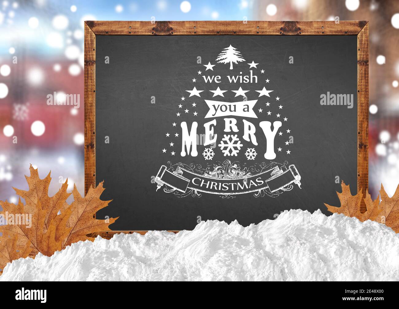 Merry Christmas and Happy New Year on blackboard with leaves and snow ...