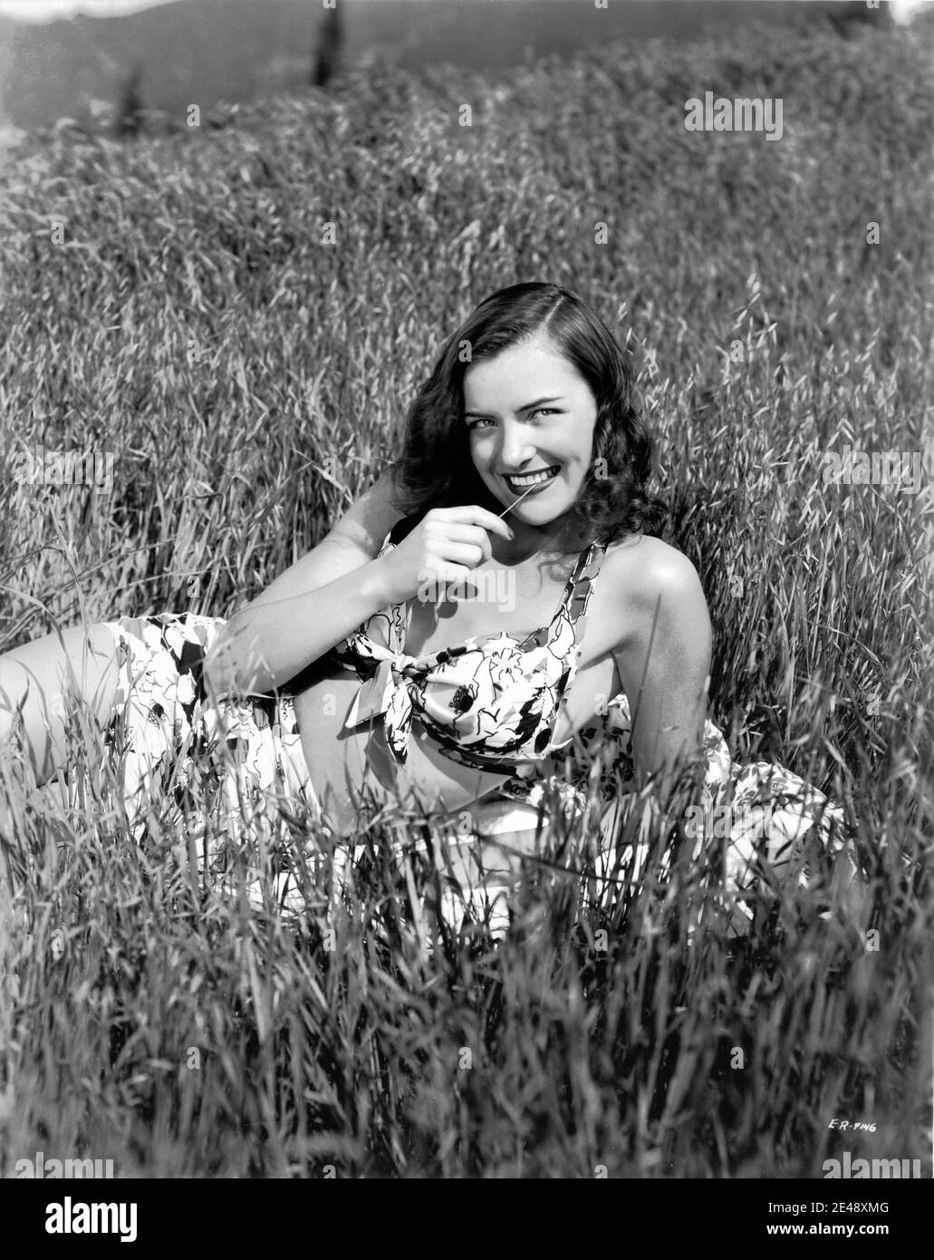 ELLA RAINES 1944 Candid Portrait Outdoors in Hayfield by ROMAN FREULICH ...