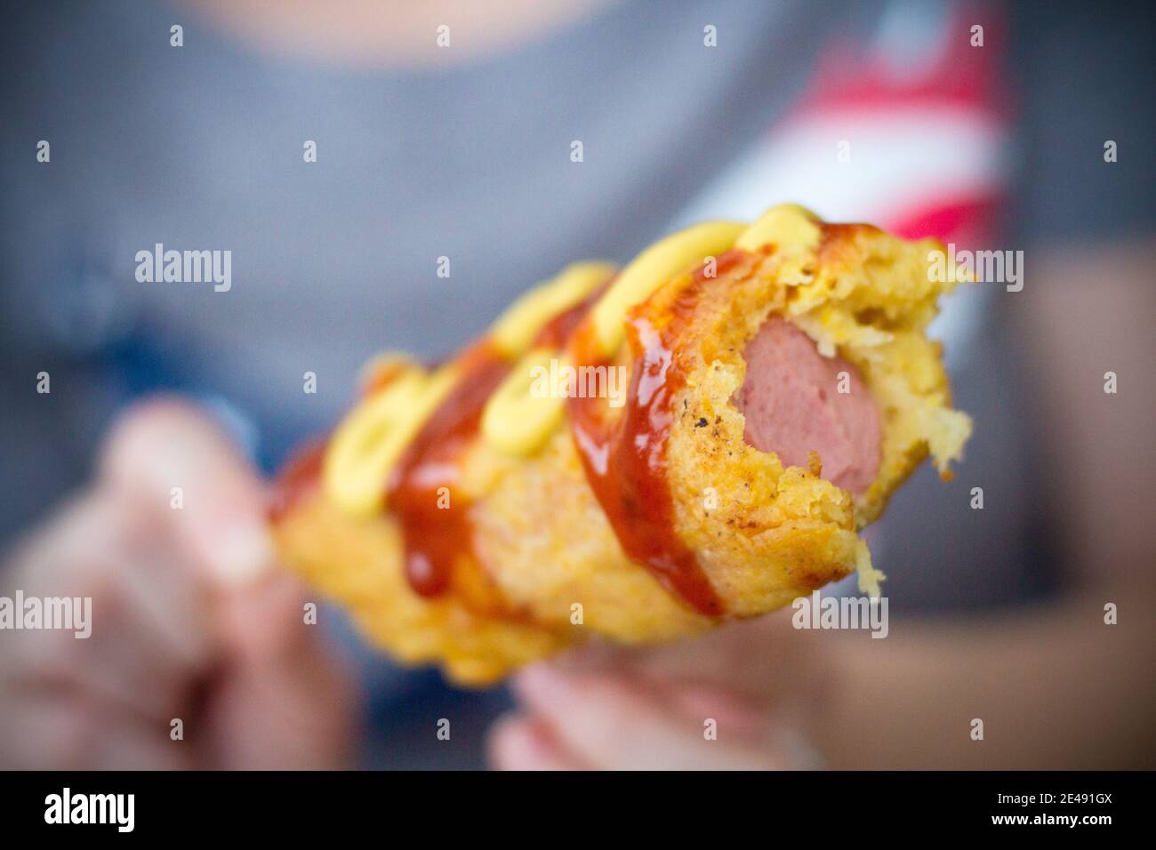 Woman corn dog hi-res stock photography and images - Alamy