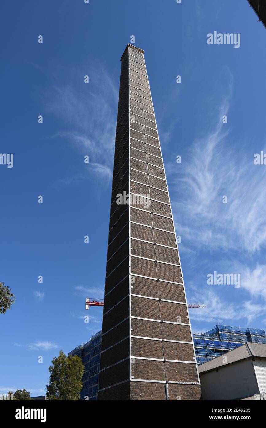 Vertical low angle shot of a high rise building in Sydney Park ...