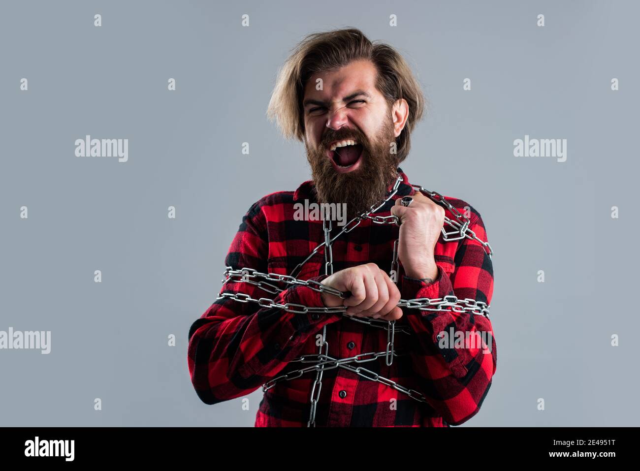 Chained bearded man hi-res stock photography and images - Alamy