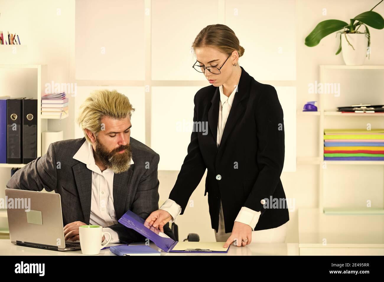 Business couple working. Couple in office. Distribute obligations and ...