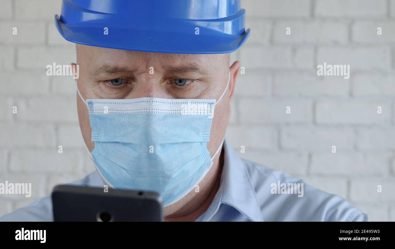Engineer with Safety Helmet and a Protection Mask on His Face Text ...