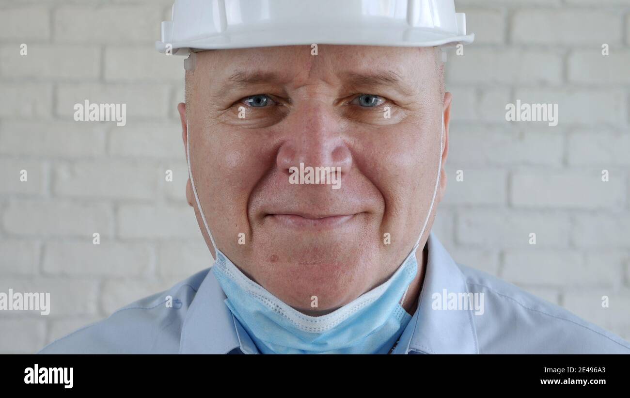 Confident Image with an Engineer Wearing Face Protection Mask Against ...
