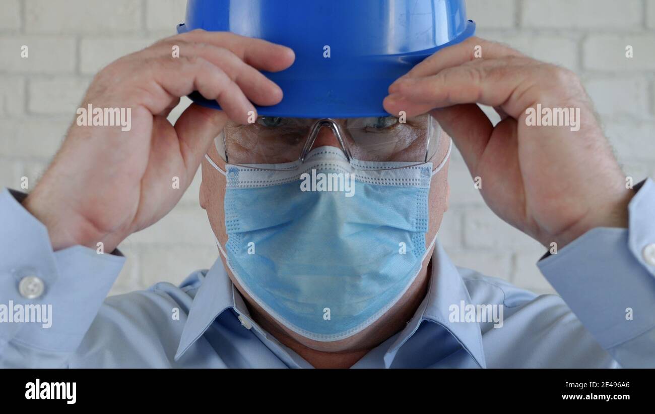Confident Image with an Engineer Wearing Face Protection Mask Against ...