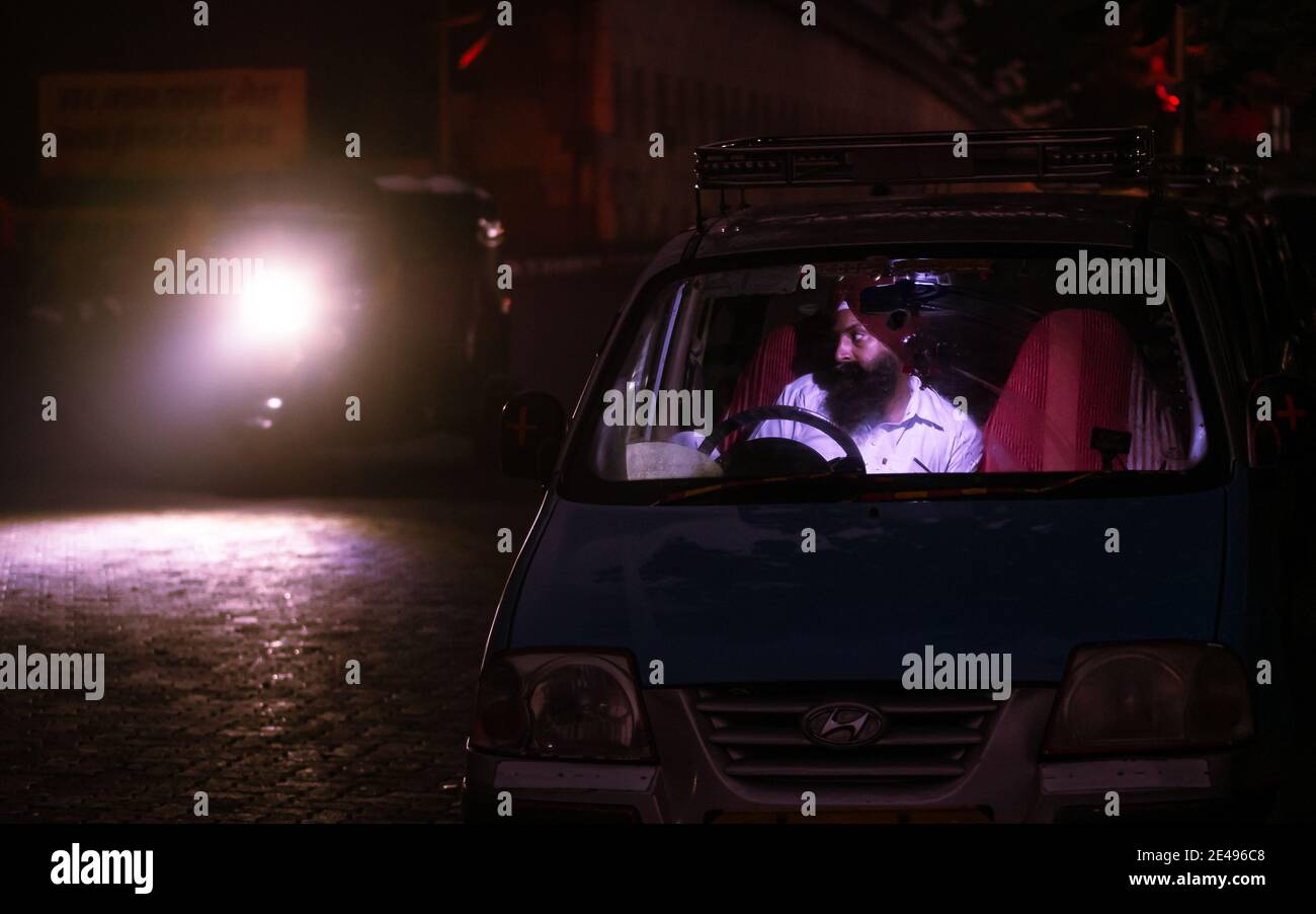 MUMBAI, INDIA - December 17, 2020 : A Sikh taxi driver seating inside a ...