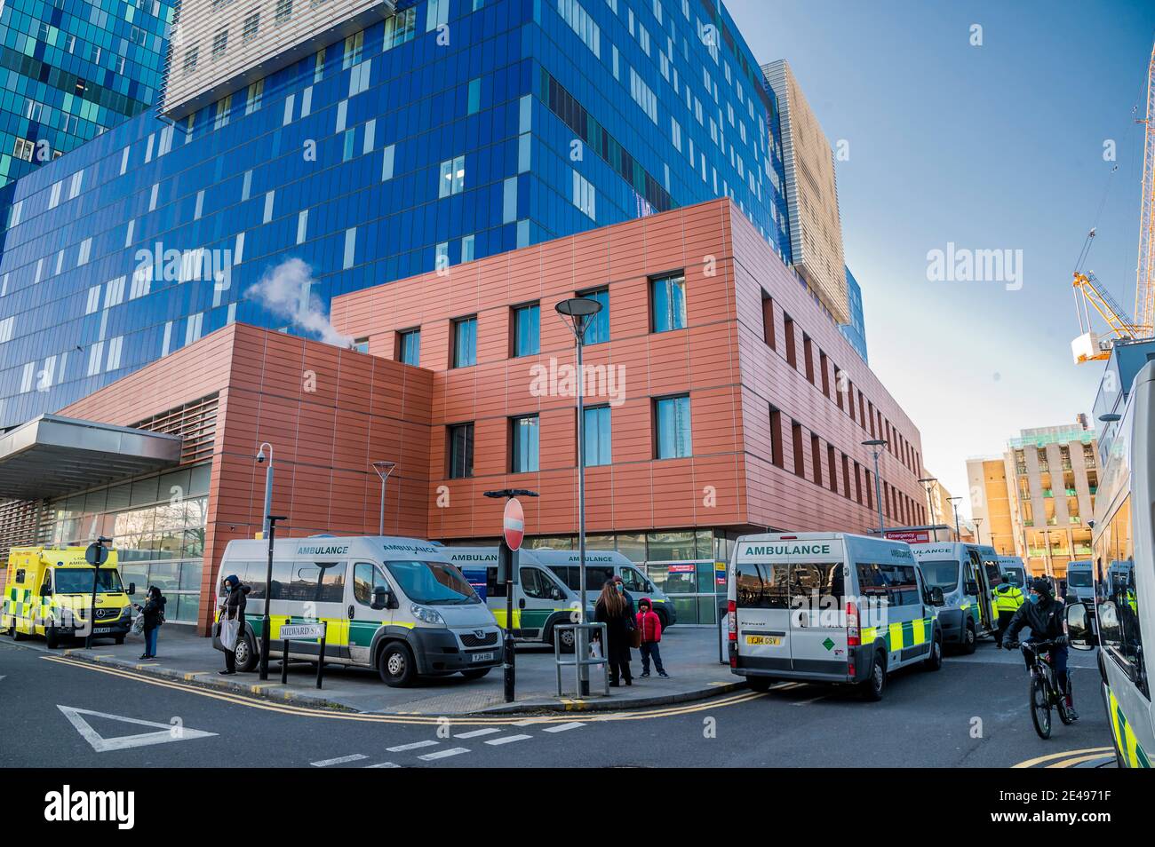 London, UK. 22nd Jan, 2021. Patient transport Ambulances waiting at the ...