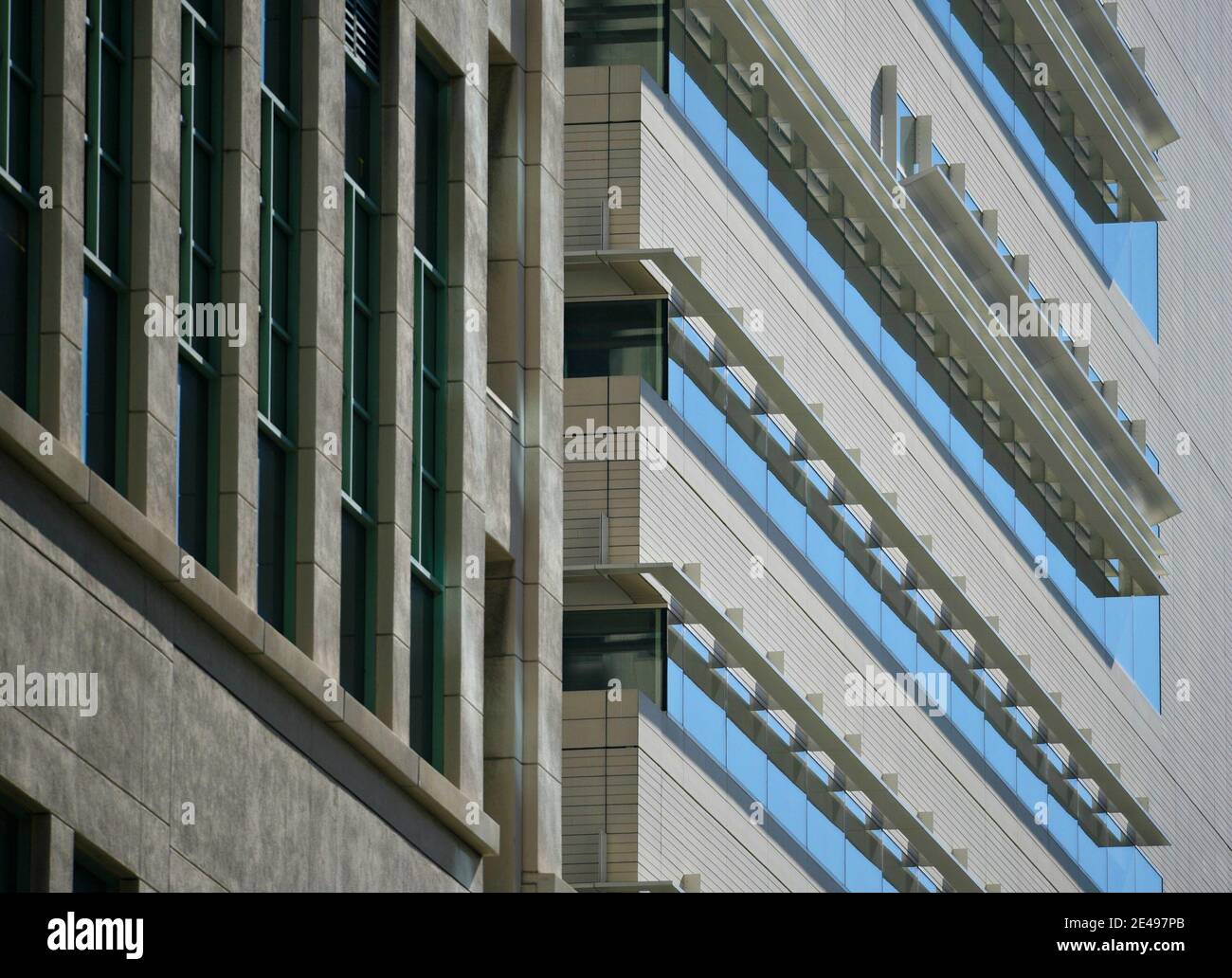 Exterior view of a high-rise corporate offices building with a white ...