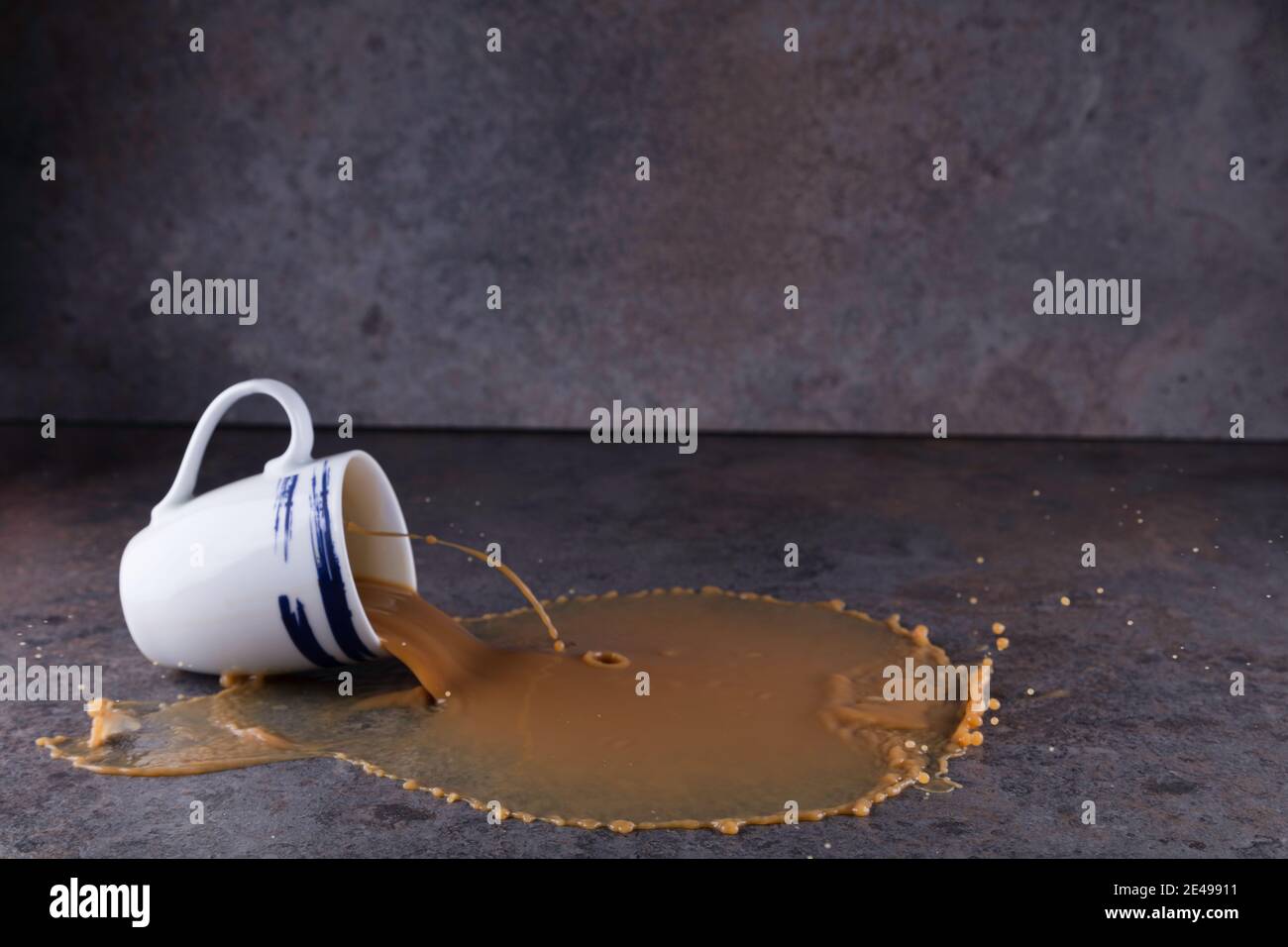 Coffee spilling from a mug. Hi-speed shot taken at 1/2500th of a second ...