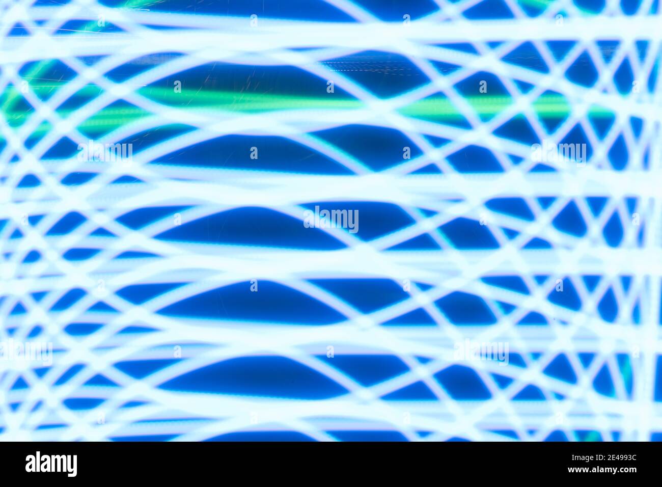 Abstract background created by repetitive curve pattern of white and ...