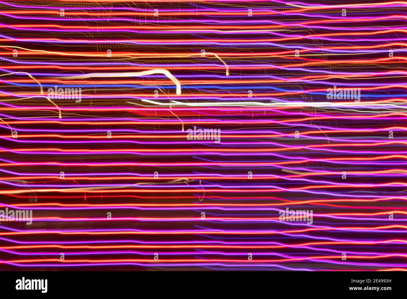 Horizontal streak effects in vivid pink, orange, red, purple and white ...