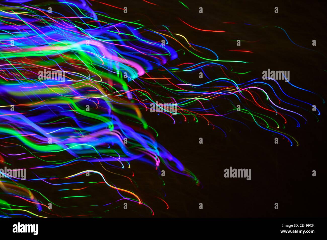 Abstract defocused multi coloured effect of energetic horizontal ...