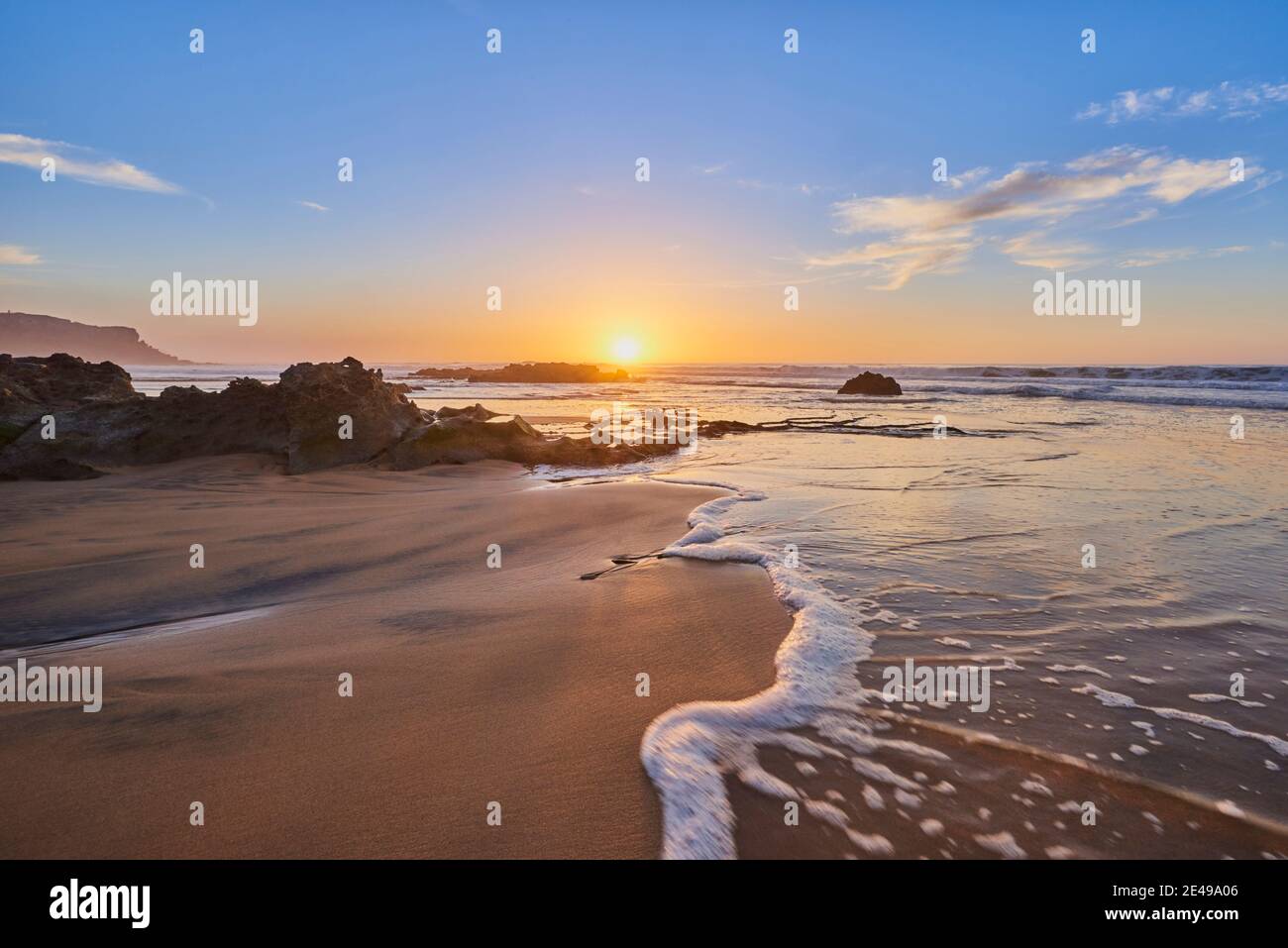 Beach with rocks at low tide, sunset, from Playa del Castillo, Playa ...